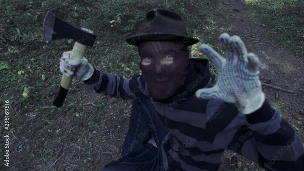 Video „Serial maniac with axe in forest, bloody killer, murderer, mad ...