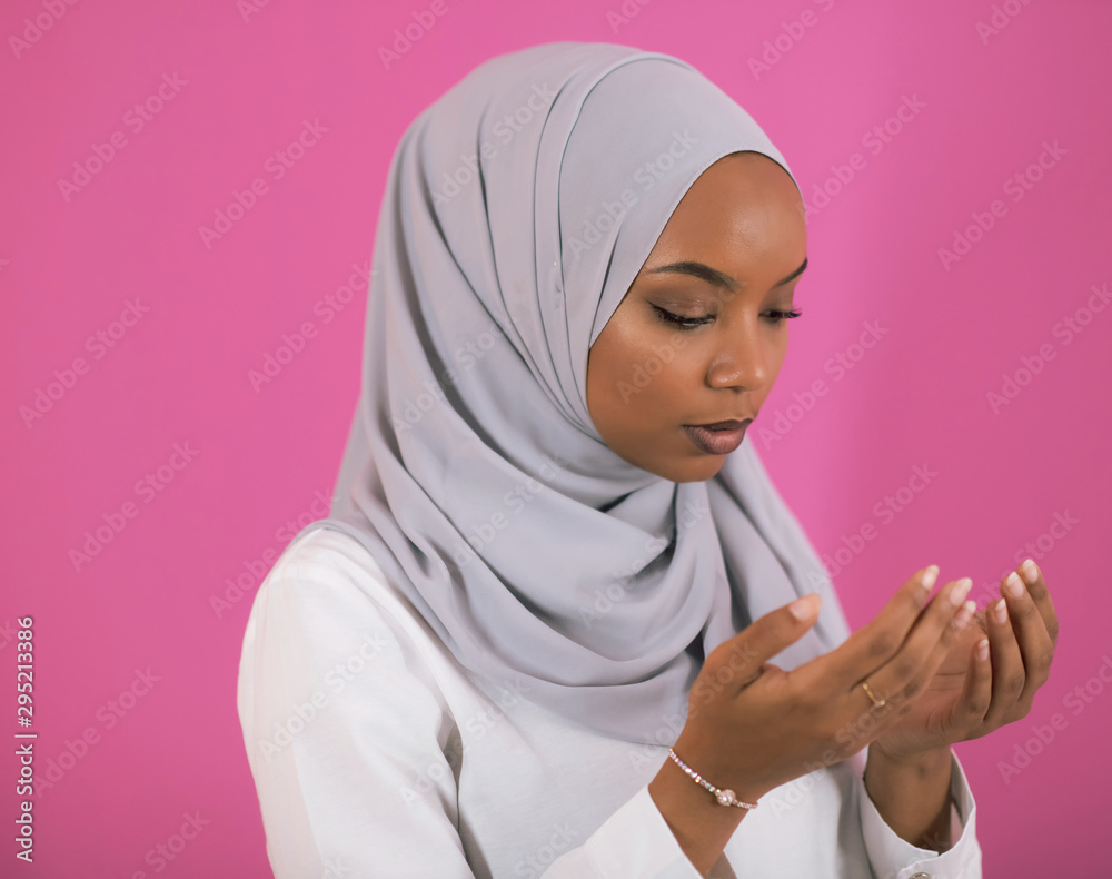 African Muslim woman makes traditional prayer to God Stock Photo ...