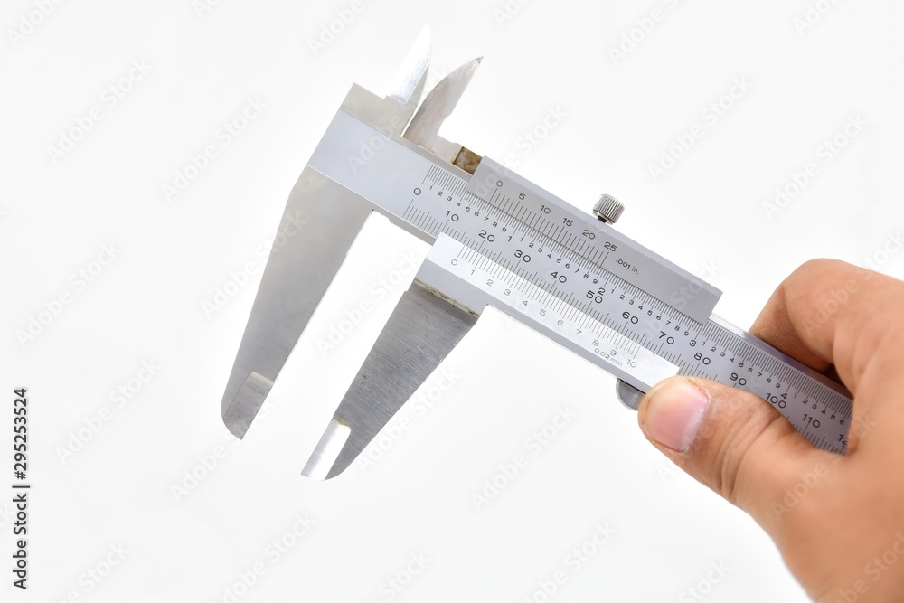Vernier caliper and mechanic's hand isolated white on background.A type ...