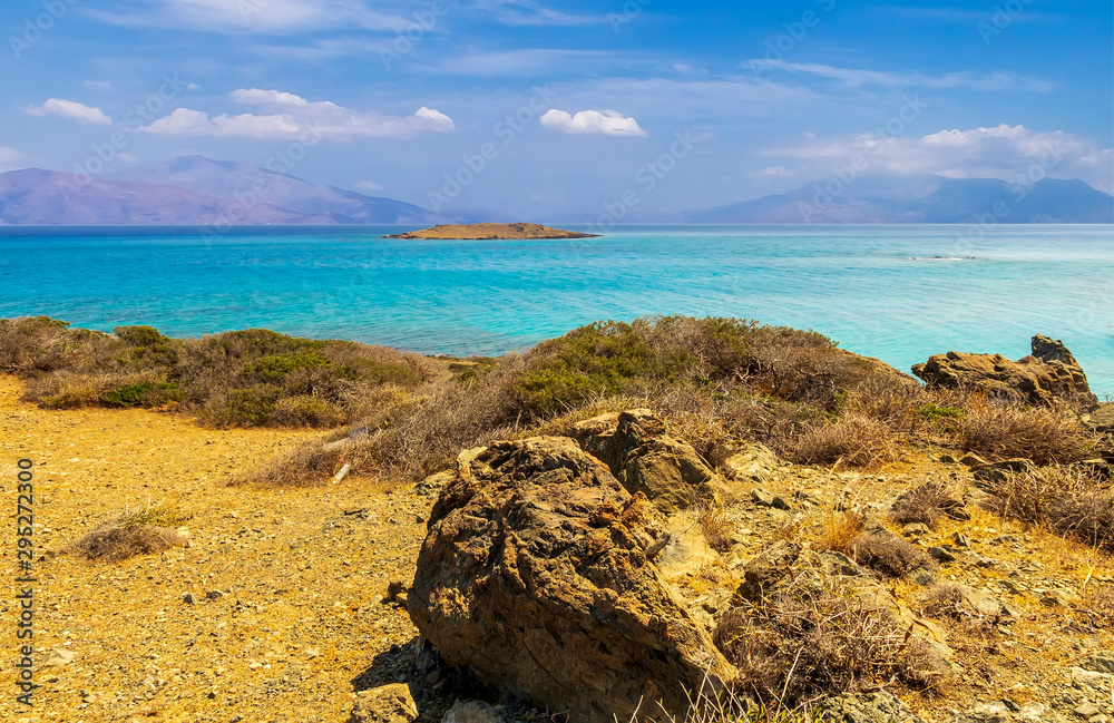 picturesque rocks in savannah with beautiful golden gtass on a coast ...