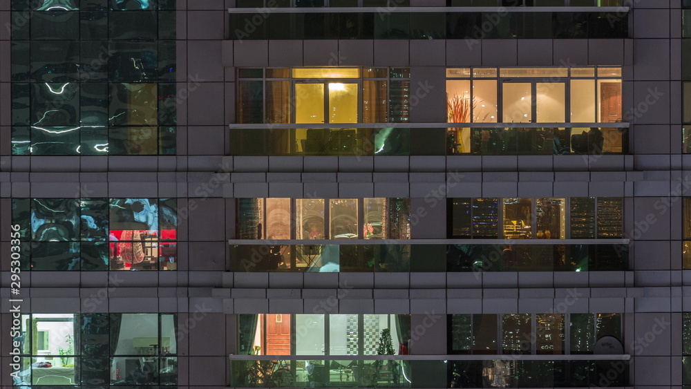 Night view of exterior apartment building timelapse. High rise ...