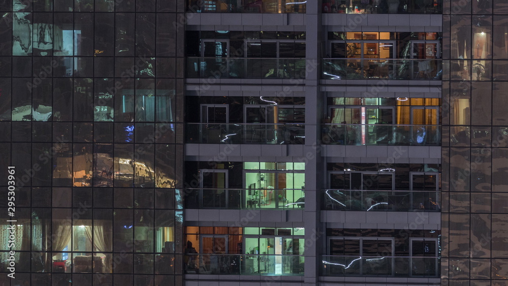 Night view of exterior apartment building timelapse. High rise ...