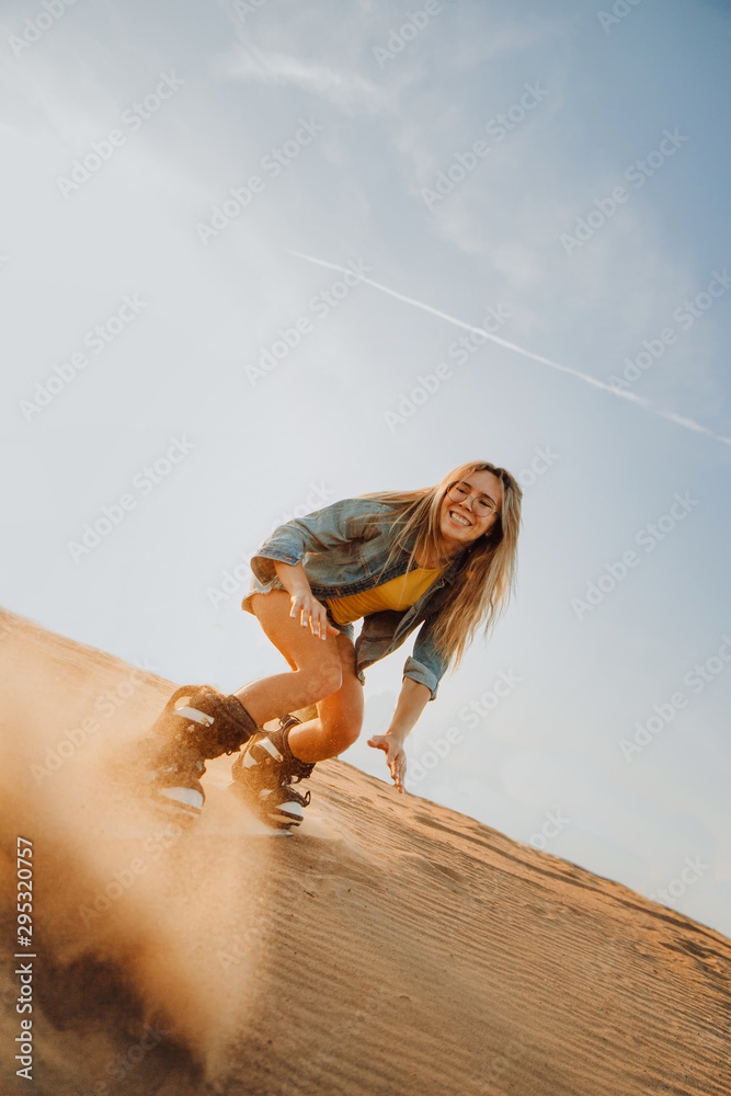 Tourist Sandboarding sexy girl In the Desert Man jumps in and does the ...