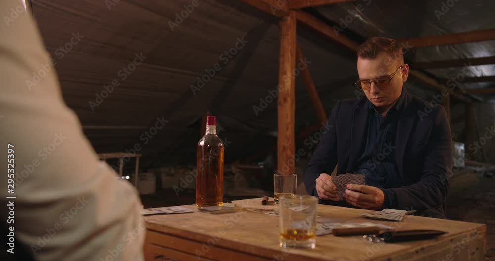 Two angry handsome elegant men talking each other for playing illegal ...