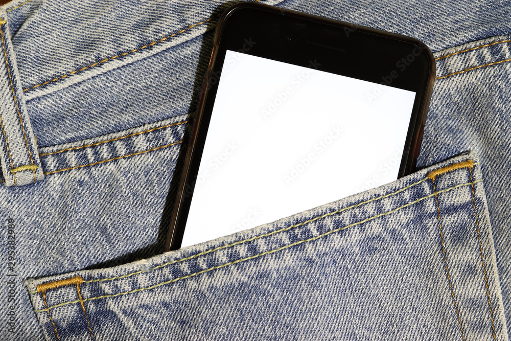 Mock up white screen phone peeping out of the pocket of light blue ...