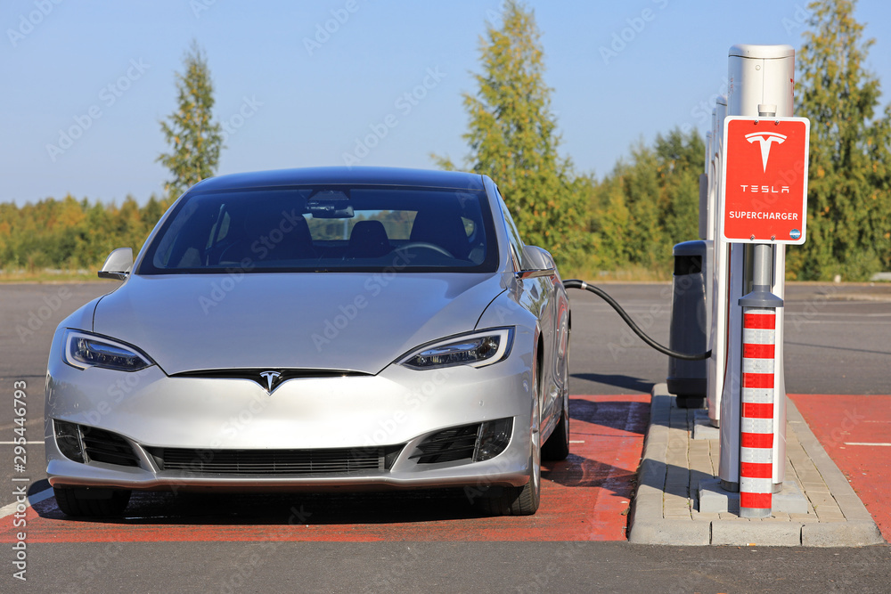 New Tesla Model S Electric Car Supercharging. Illustrative editorial ...