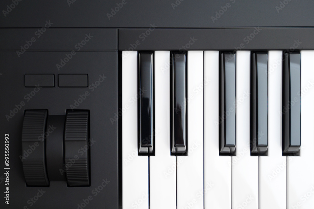 Professional midi keyboard synthesizer with knobs and controllers ...