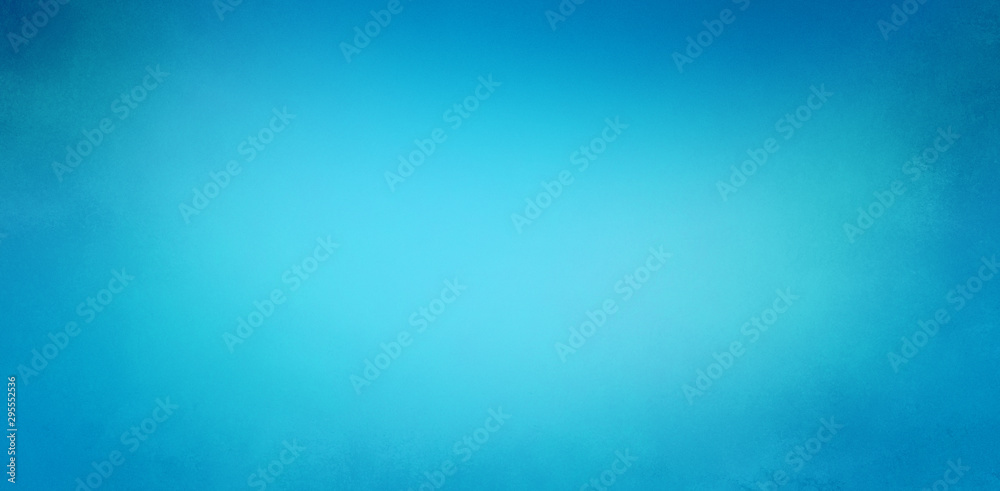 blue background with soft blurred texture, light center and dark blue ...