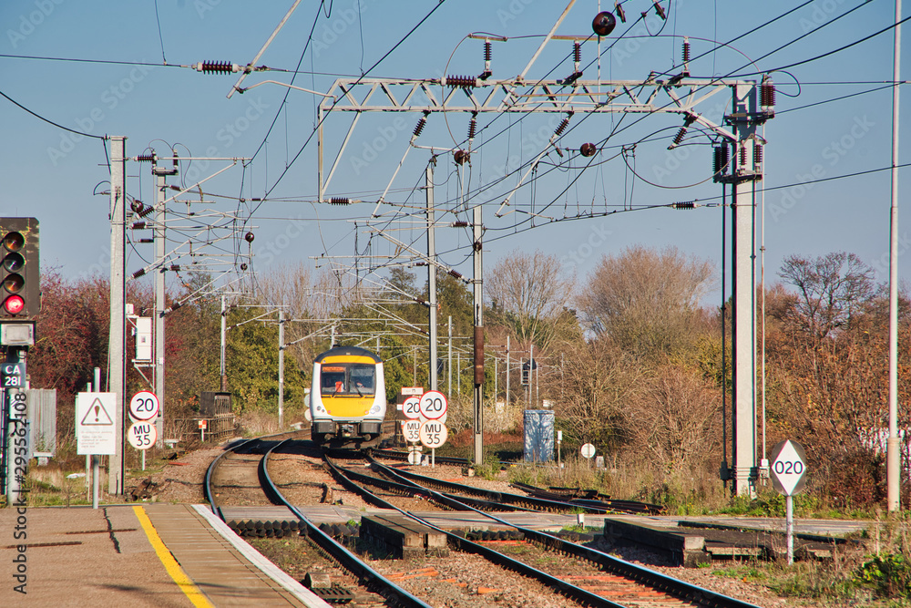 train station in uk, blue sky background Stock Photo | Adobe Stock