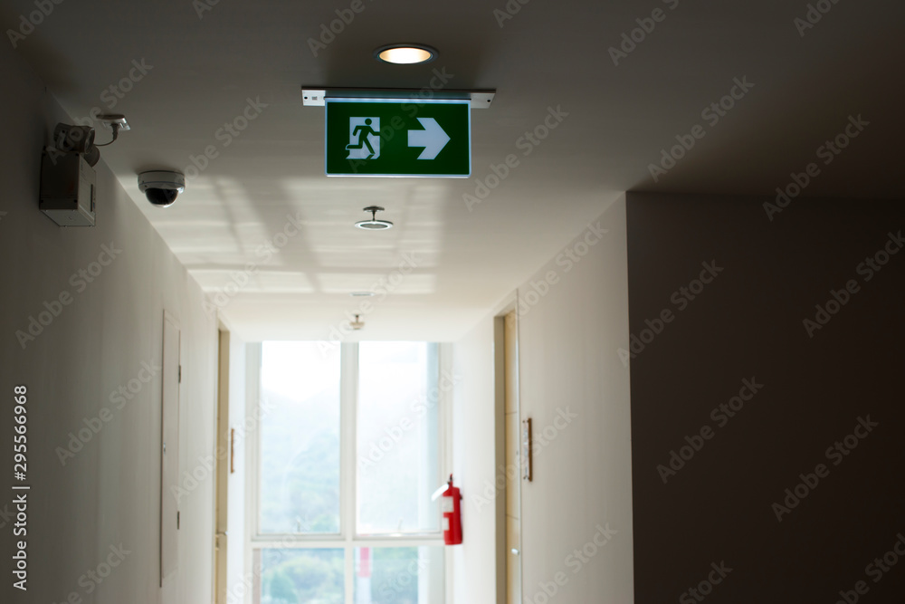 Sign : Emergency exit sign at path way indoor building public facility ...