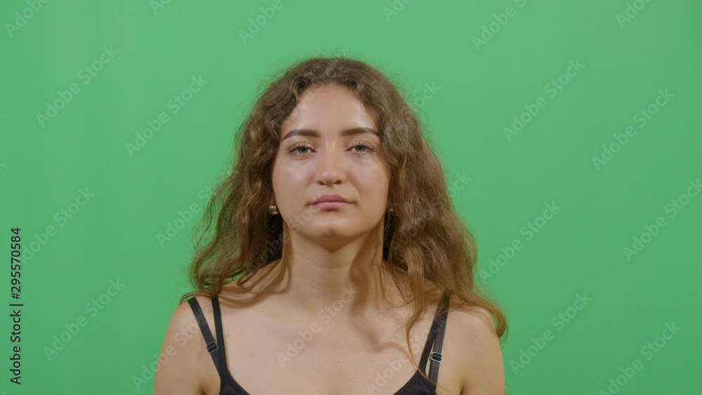 Woman Pimple Popping Looking At The Camera. Studio Isolated Shot ...