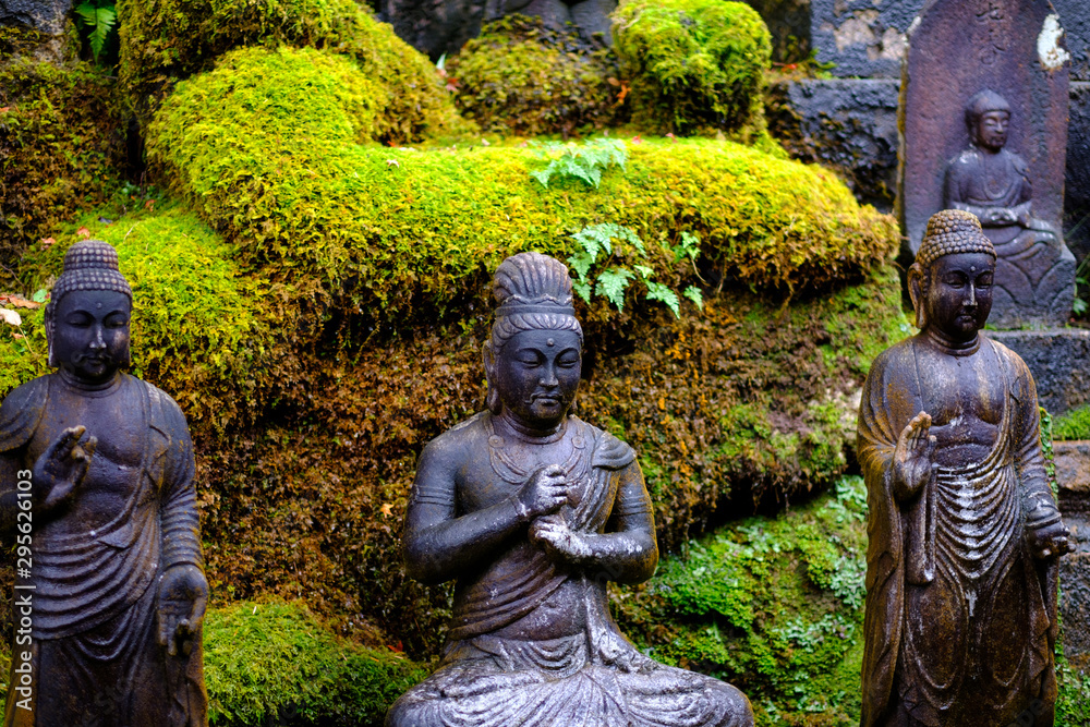 Japanese gods statue in mitakidera temple garden, Hiroshima Stock Photo ...