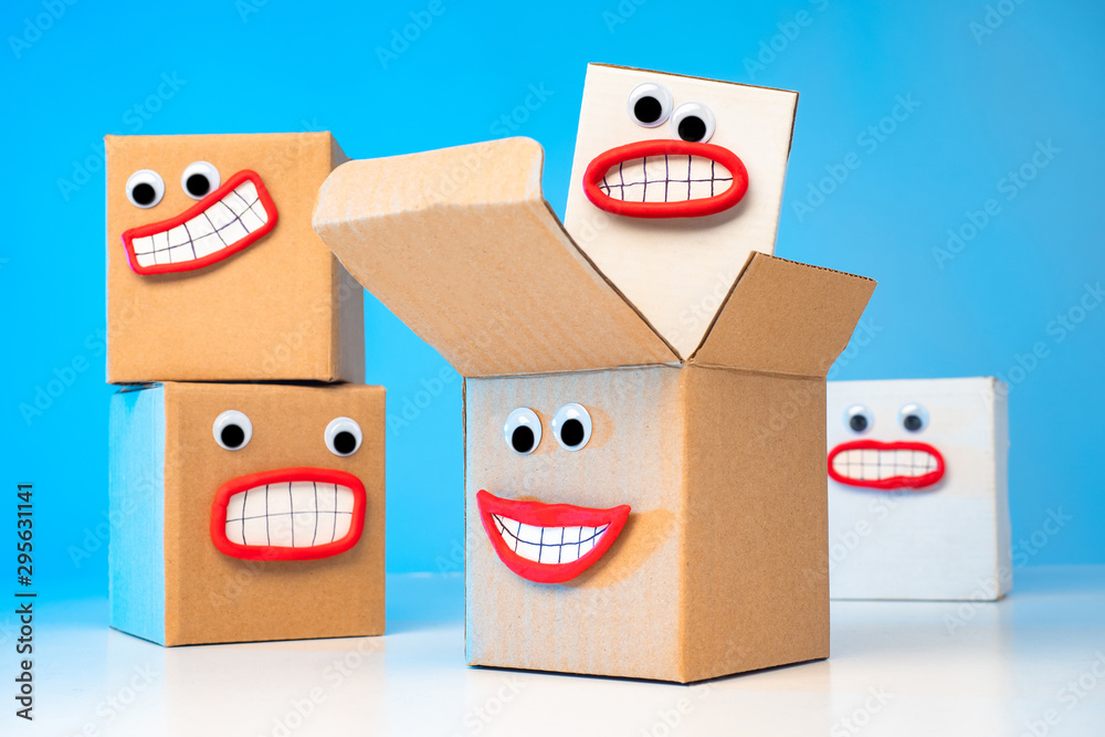 Emoji. Cardboard boxes have faces. Parcels await delivery. Gifts want ...