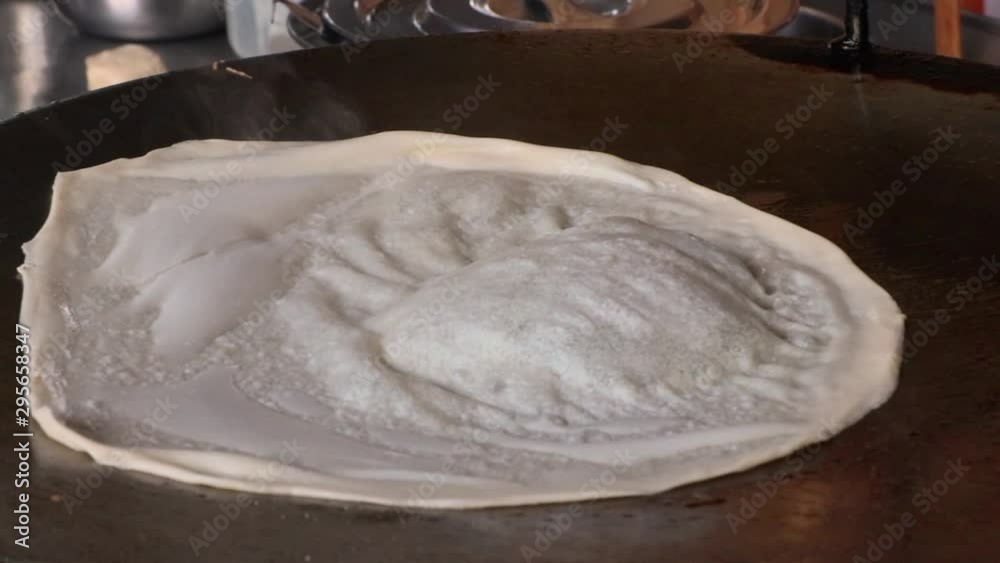 Roti Making, roti thresh flour by roti maker with oil. Indian ...