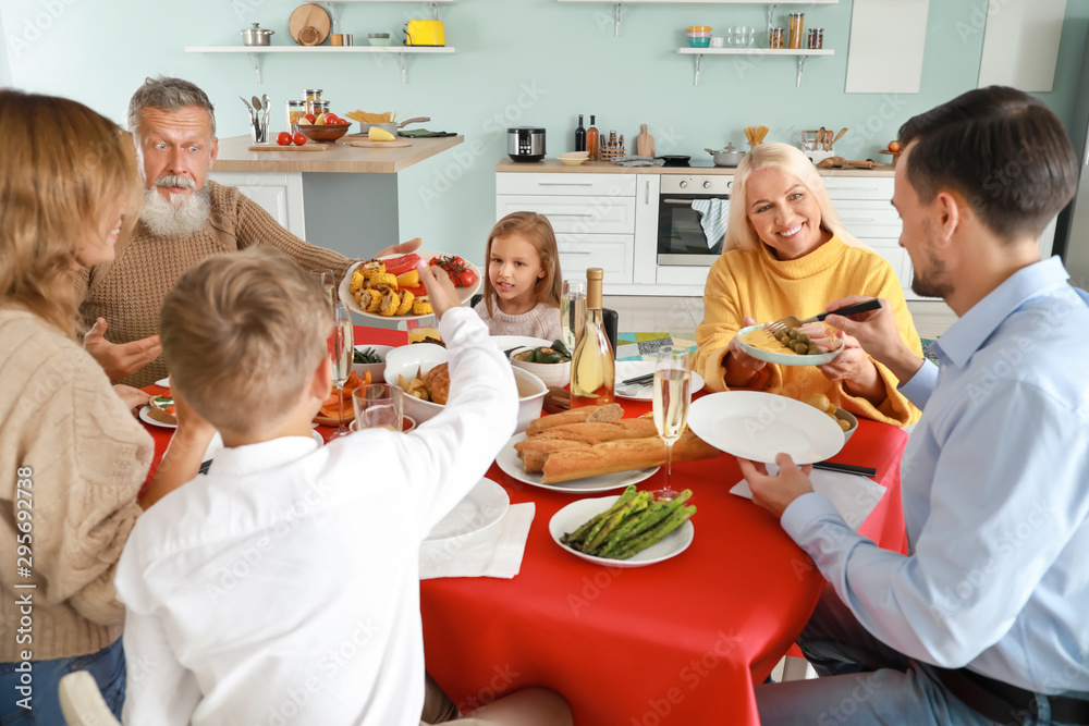 Big family having dinner at home Stock Photo | Adobe Stock