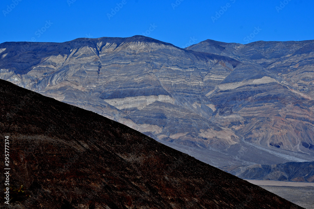 Complex geology of folded and faulted Paleozoic rocks with basaltic cap ...