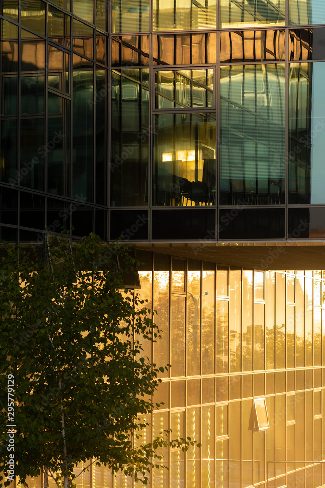 Reflection of sunset light in a window of a modern building. Stock ...