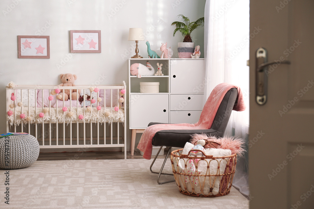 Cozy baby room interior with comfortable crib Stock Photo | Adobe Stock