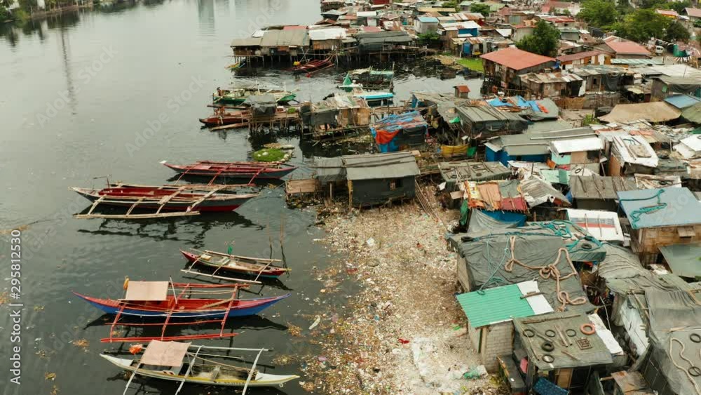 Houses and boats of the poor inhabitants of Manila. Dwelling poor in ...
