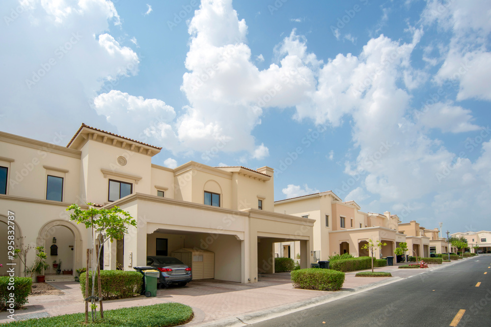 Luxury villa compound housing development with beautiful blue sky with ...