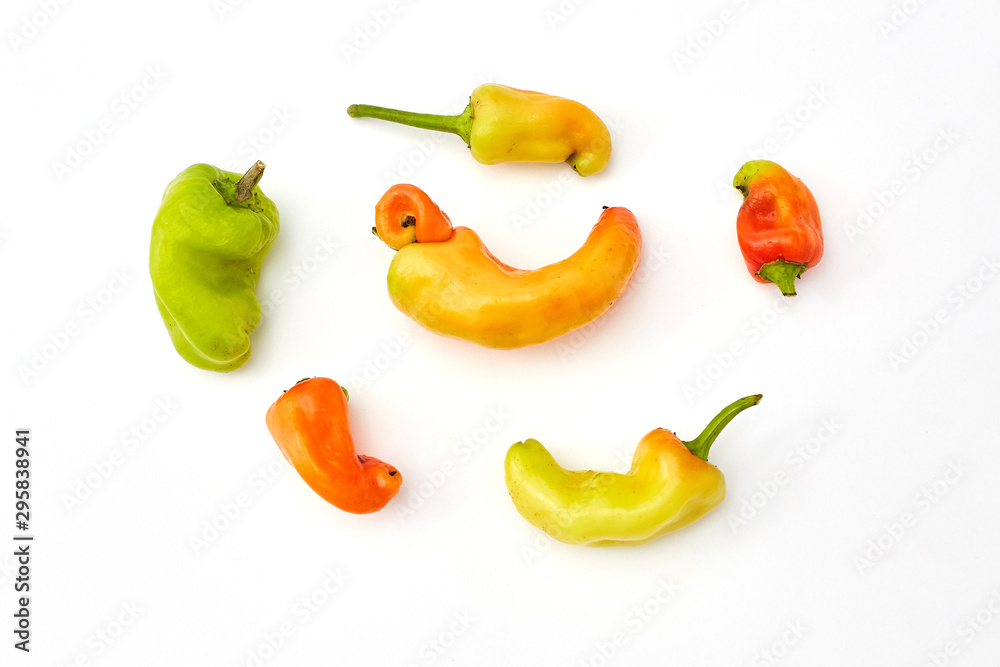 Trendy ugly organic fruits and vegetables. peppers on white background ...
