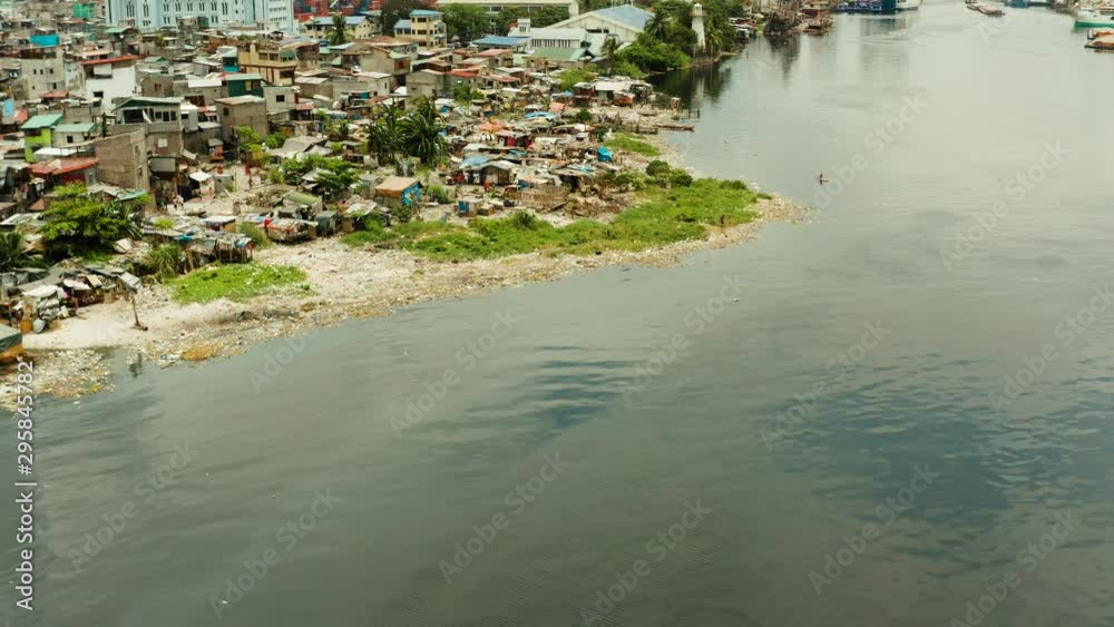Slums in Manila, a top view. Sea pollution by household waste. Plastic ...
