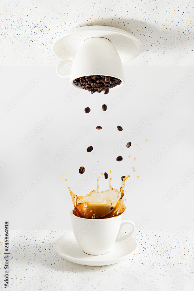 Coffee creative concept. Cup of coffee with splash and cup of coffee ...