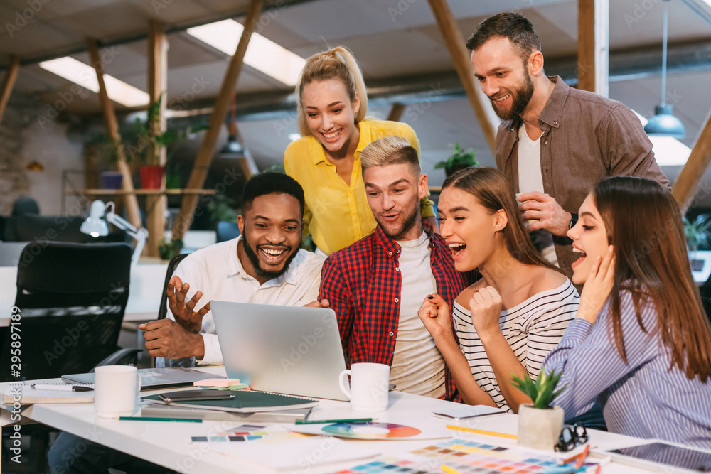 Lucky corporate team. Designers celebrate successful project Stock ...