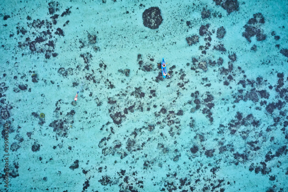 Kayaking on pristine blue water in Fiji from a 5 star resort drone ...