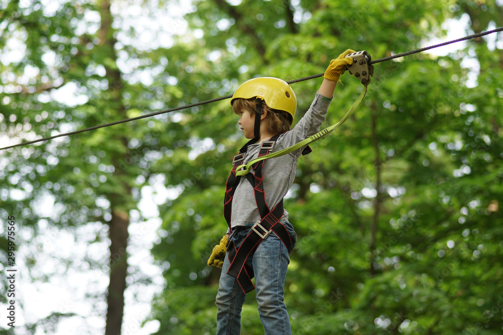 Go Ape Adventure. Adventure climbing high wire park. Child. Happy child ...