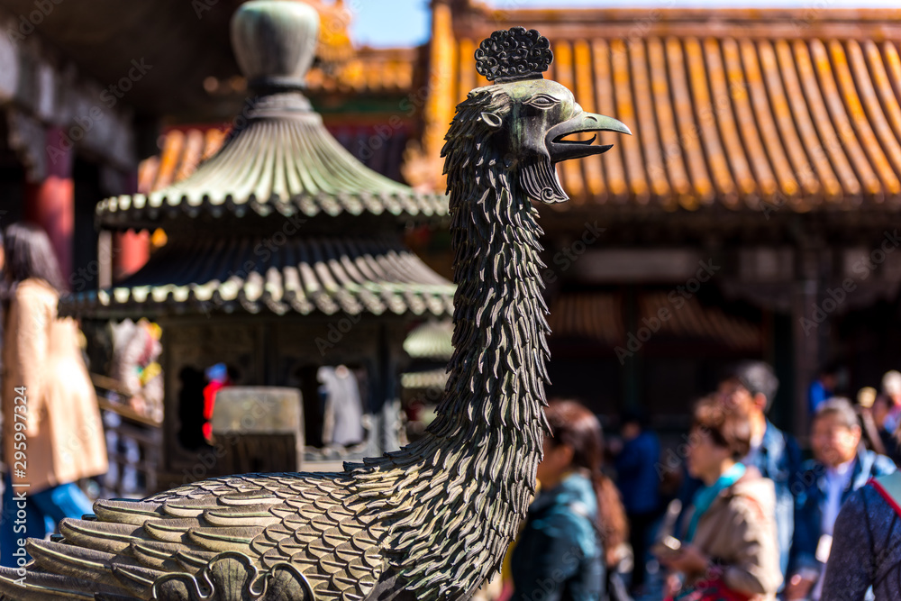 Bronze statue of phoenix in front of Yukun Palace, one of the Six ...