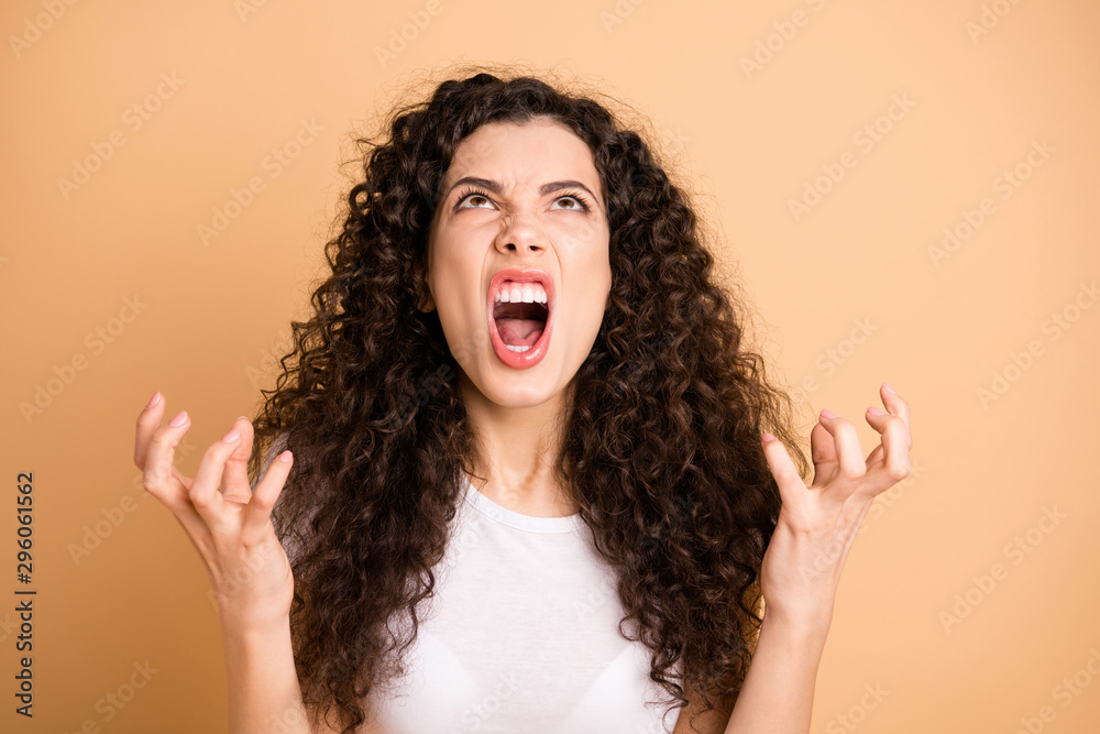 Photo of evil woman of fury bothered by stupid people around her ...