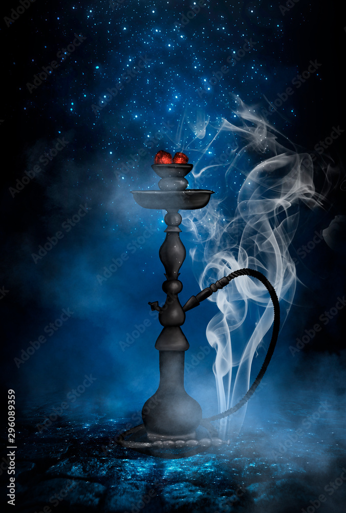 Dark night magic scene. Eastern hookah with smoke on the old ...