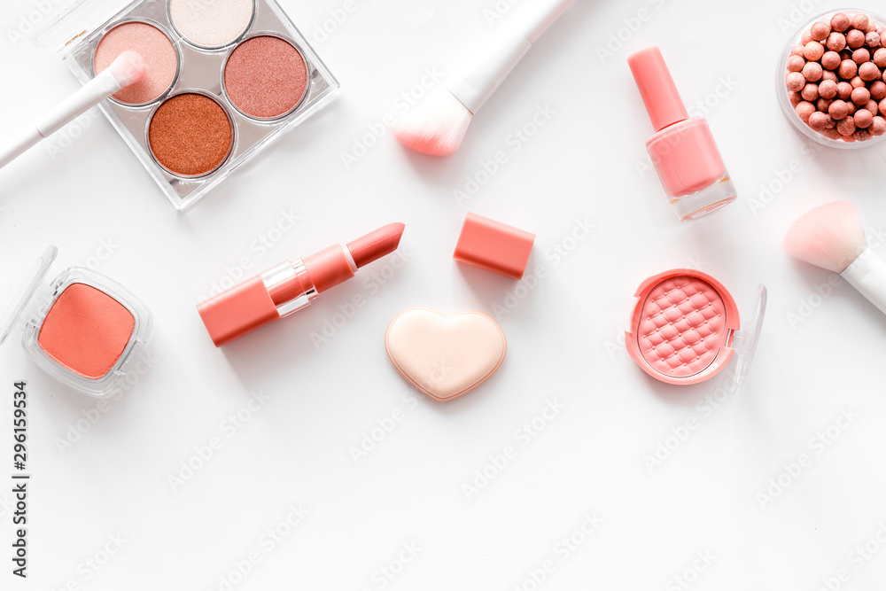 Makeup set with powder, rouge and brusheson white background top view ...