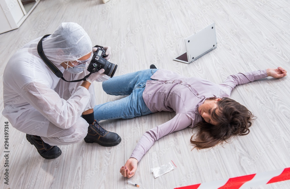 Forensic Investigator At The Crime Scene Investigating Woman Mur Stock