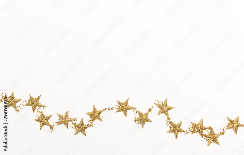 Gold star string on a white background Stock Photo | Adobe Stock
