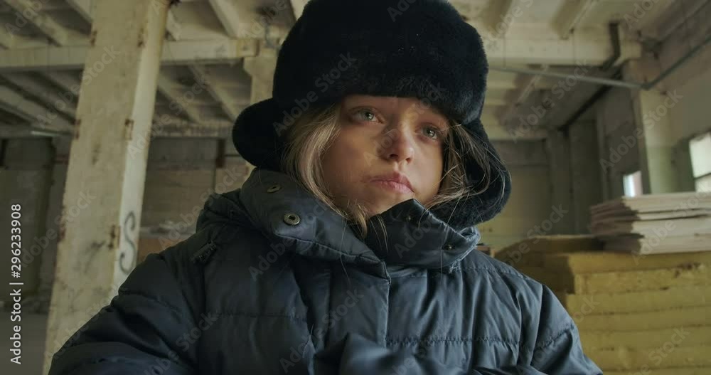 Sick homeless Caucasian girl with grey eyes caughing and looking away ...