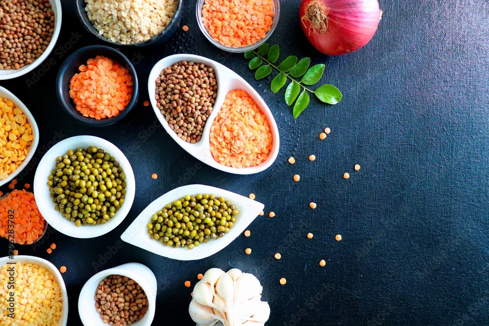 Composition of dry legumes. Assortment of colorful legumes in bowls ...