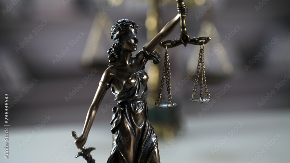 Scale of justice. Wooden judge`s gavel. The criminal law. Low concept ...