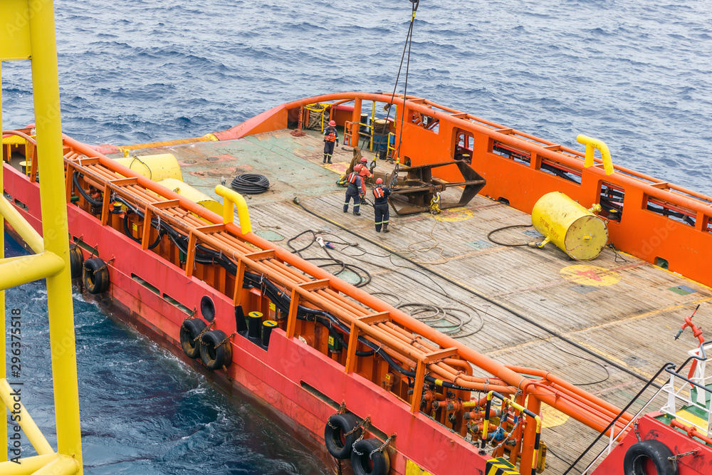 Anchor handling activities by a anchor handling tugboat for a ...