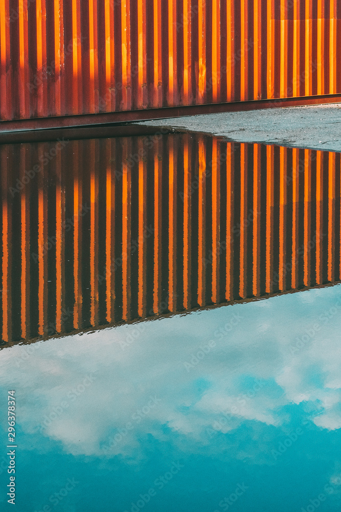 Reflection of cargo container in water Stock Photo | Adobe Stock