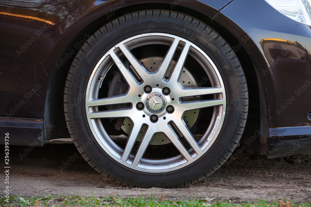 Car wheel by AMG with Mercedes Benz logo Stock Photo | Adobe Stock
