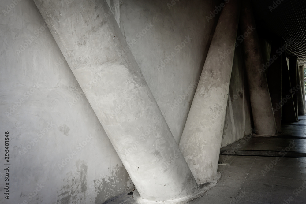 Round concrete column in v-shape design Stock Photo | Adobe Stock