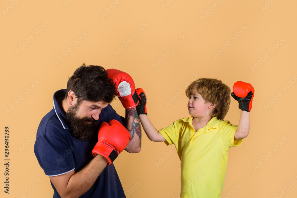 Trainer teaching kid how to hit punches. Boxing childs training. Kid in ...