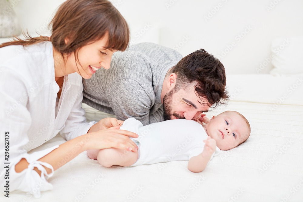 Caring parents changing diaper Stock Photo | Adobe Stock