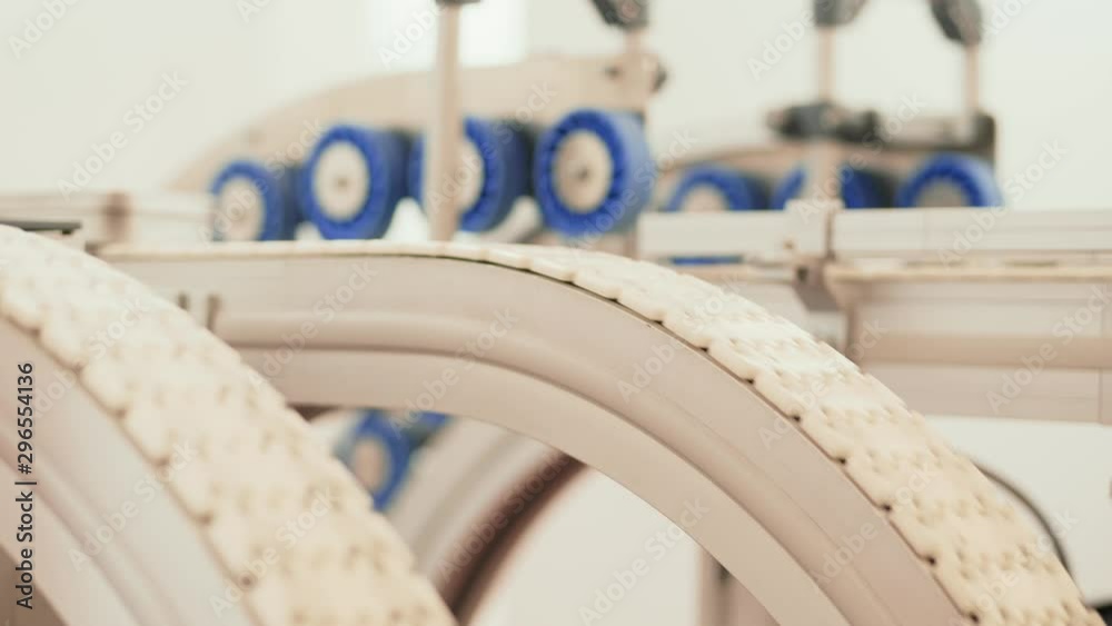 Magnetic high speed conveyor belt with moving different forms tin cans ...