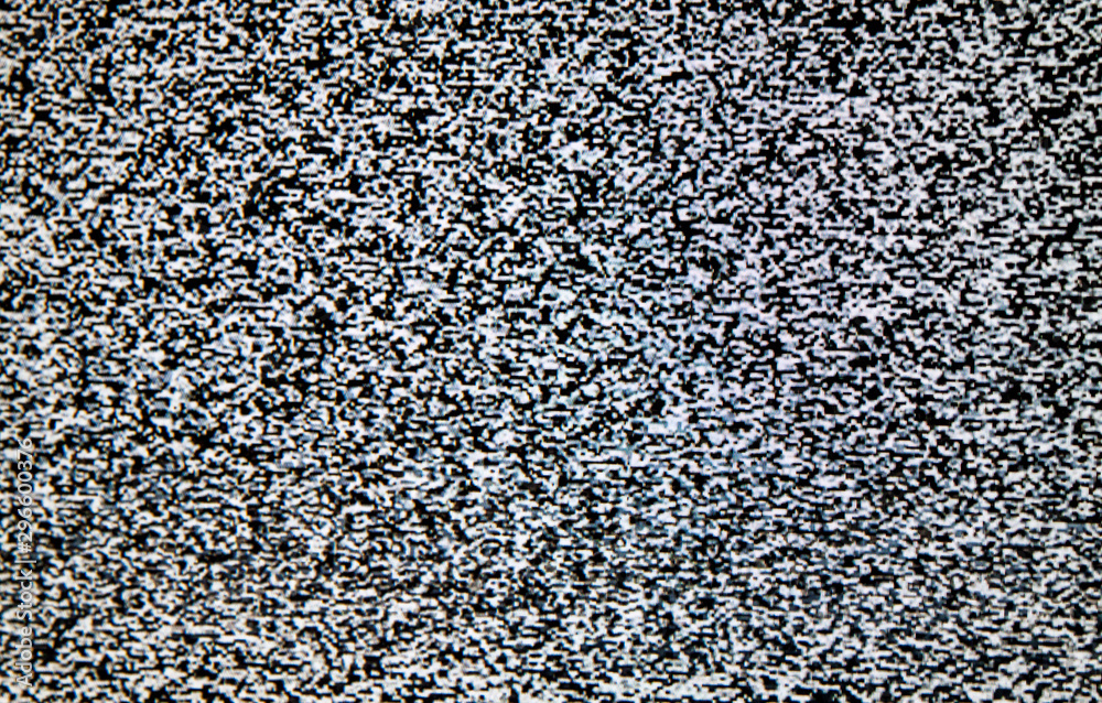 static black and white noisy analog TV screen when signal is lost or ...