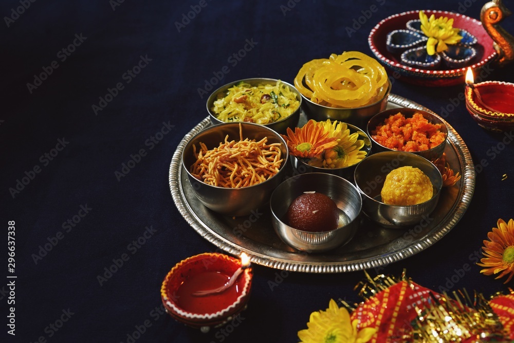 Homemade Diwali foods- snacks and desserts on festive background Stock ...