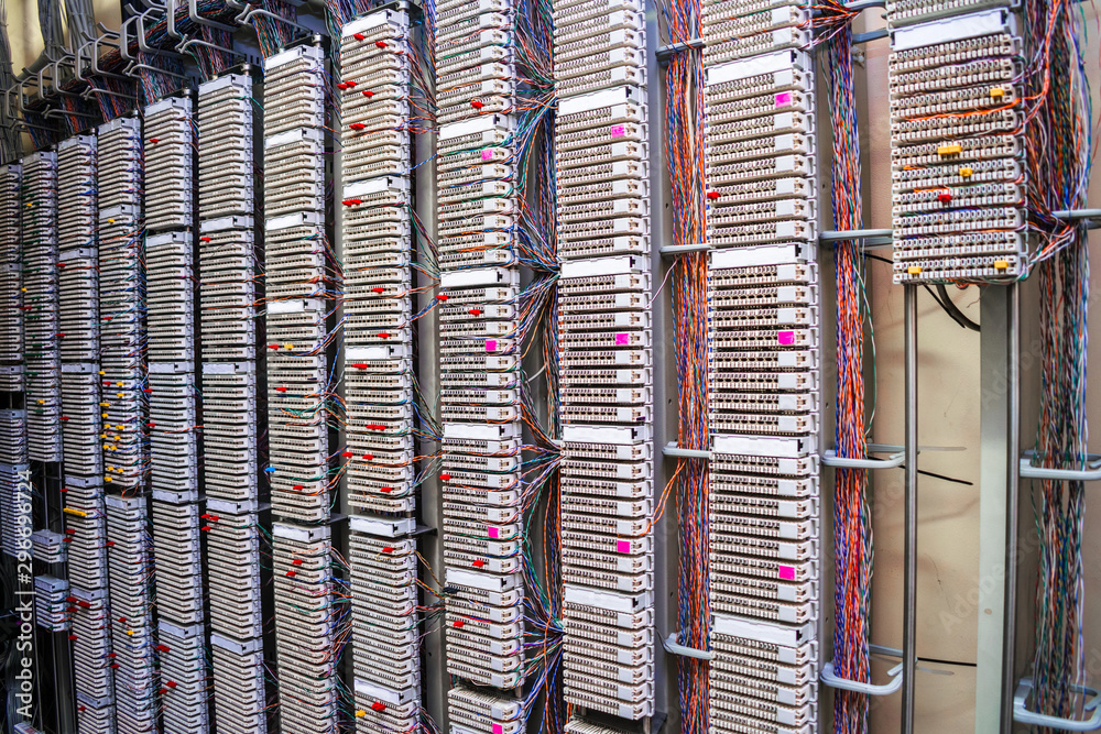 Patch panel ip telephony is installed on the wall of the data center ...