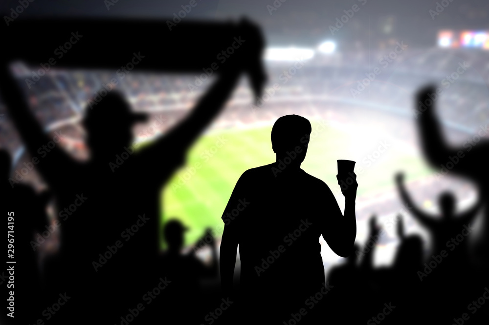 Football fan drinking beer in crowd in stadium. Man with alcohol ...